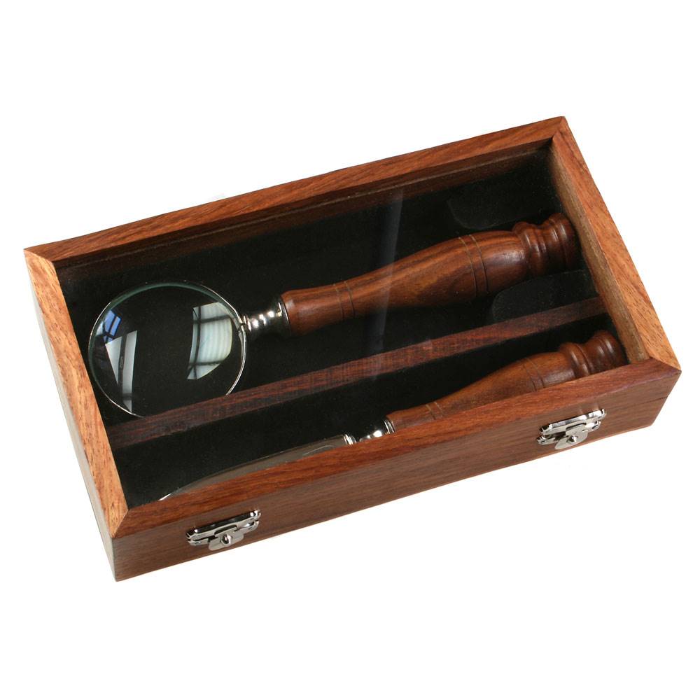 Magnifying glass and letter opener in wooden box